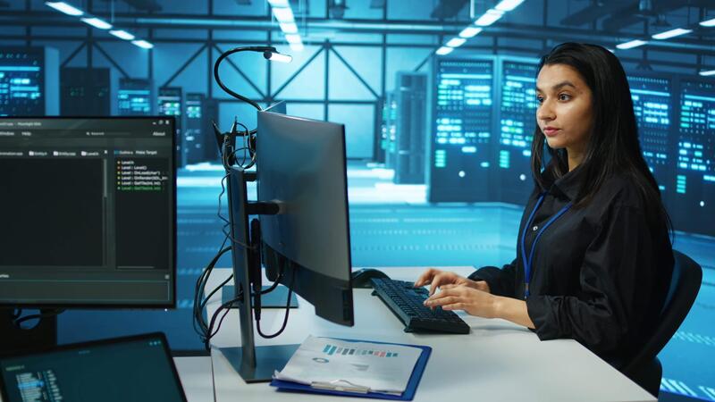 It Engineer In Data Center Using Pc To Find Misconfigurations Affecting