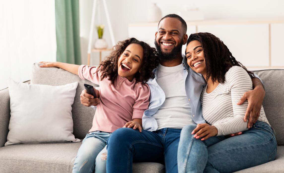 African Family Watching Tv Stock Photos, Images and Backgrounds for Free Download