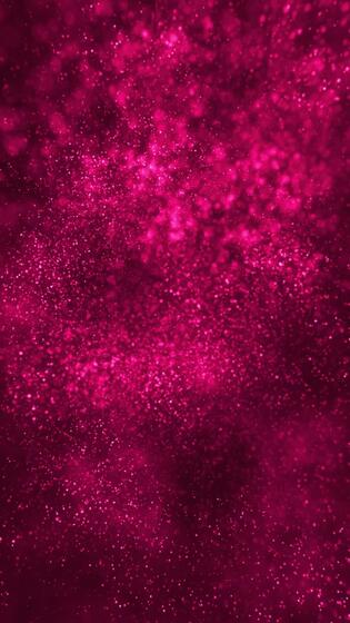 Abstract background animation with glittering shiny pink particles and shallow depth of field ...