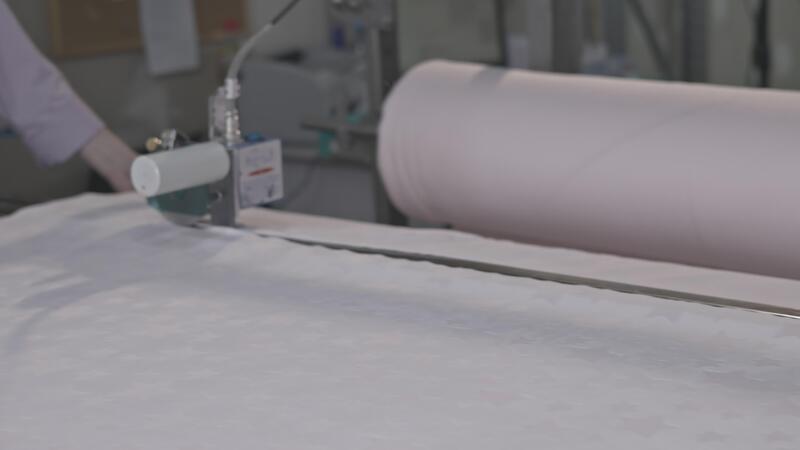 Woman Worker Using An Automatic Cutting Complex For Fabrics Media
