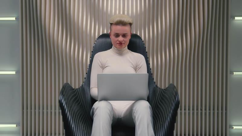 Caucasian woman girl in futuristic studio coder gamer female IT programmer hacker software ...