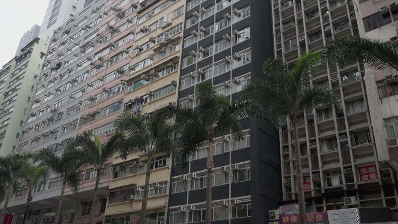 Hong Kong Street with tall houses 53808948 Stock Video at Vecteezy