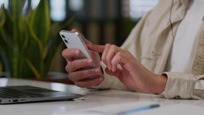 Person Scrolling On Phone Stock Video Footage for Free Download