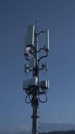 A modern telecom tower equipped with advanced 5G antennas for seamless connectivity 53954467 ...