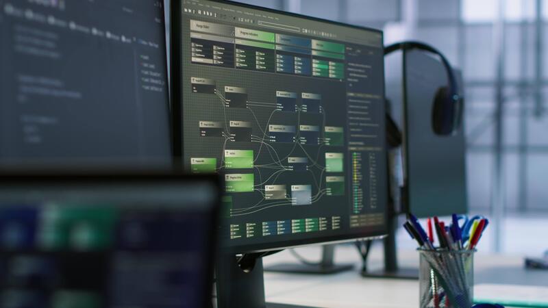 Close up of computer displays in empty data center establishment monitoring hardware energy ...