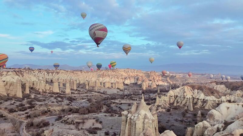 Goreme, Turkey, 2024 -aerial panoramic view hot air balloons morning ...