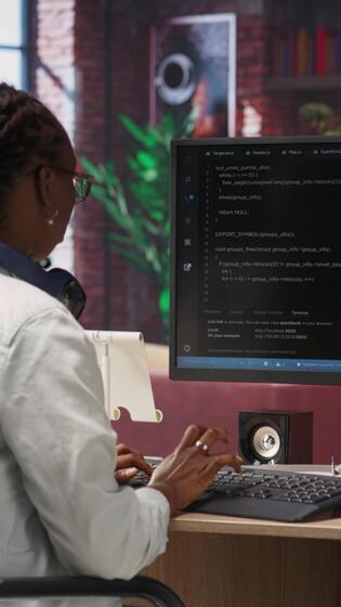 Vertical Admin Uses Computer For Artificial Intelligence Computing