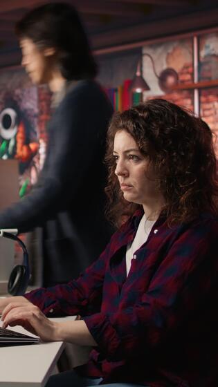 Vertical Smiling Woman Using Programming Languages On Pc In It Startup Office To Build