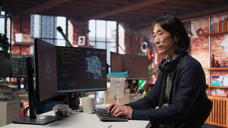 AI startup senior programmer overseeing deep learning application, thinking how to improve ...