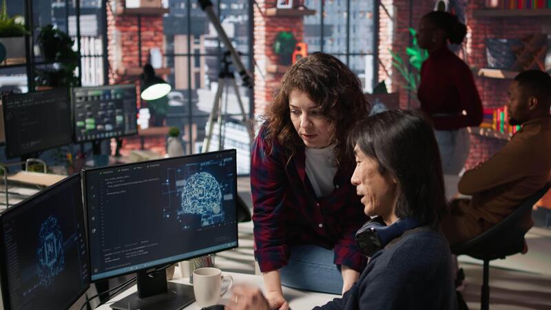 Happy programmer coming to AI startup office CTO manager desk to request help with building ...