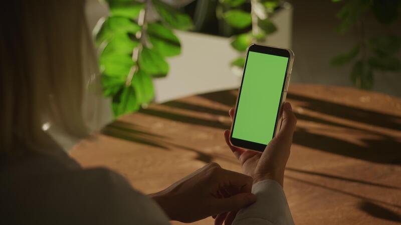 Swiping upward on green screen smartphone 56334020 Stock Video at Vecteezy