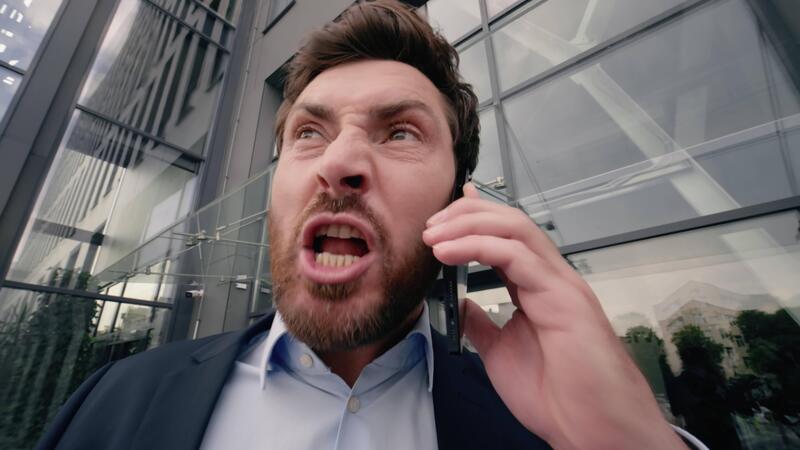 Angry crazy mad furious yelling smartphone call male close up ...
