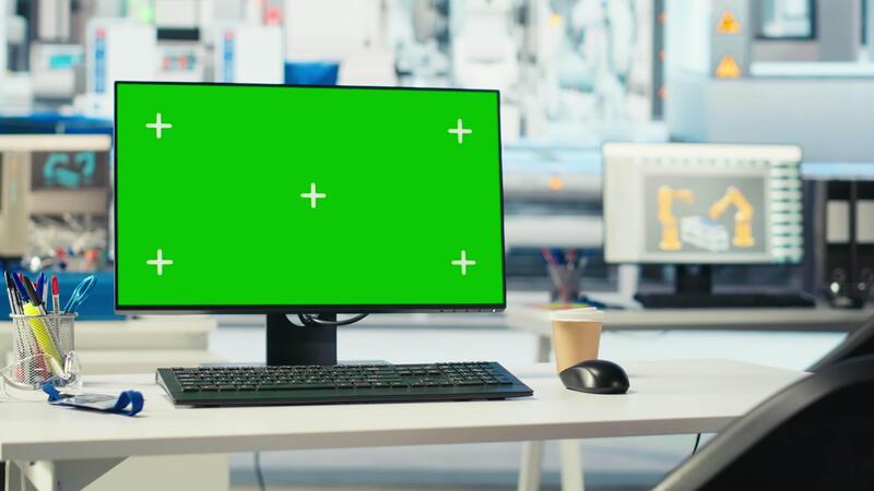 Mockup PC display in photovoltaics factory used to monitor system performance. isolated screen ...