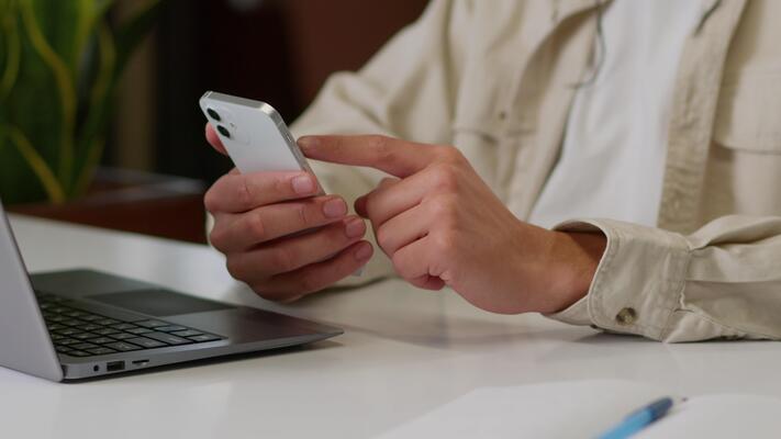 Person Scrolling On Phone Stock Video Footage for Free Download