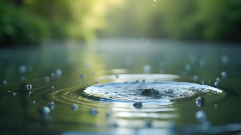 Relaxing Nature Scene, Close-Up of Water Droplets Creating Ripples on a ...