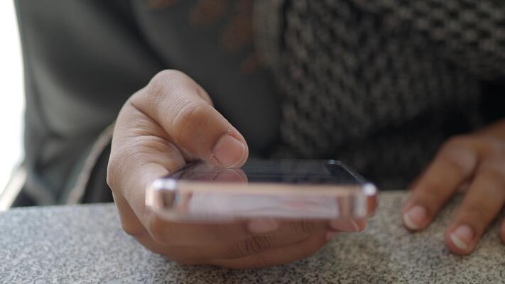 Person Scrolling On Phone Stock Video Footage for Free Download