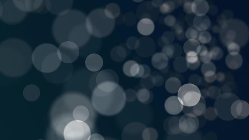 Abstract bokeh animation with gently flickering defocused bokeh light spheres. This motion ...