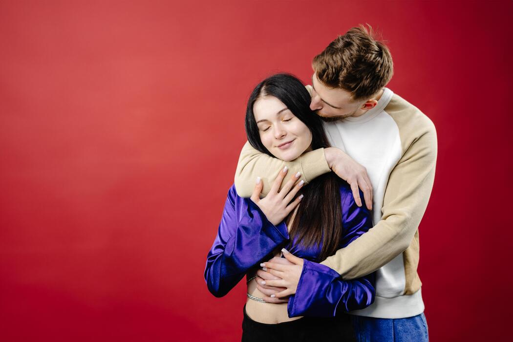 Two People Hugging Stock Photos, Images and Backgrounds for Free Download