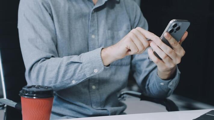 Person Scrolling On Phone Stock Video Footage for Free Download