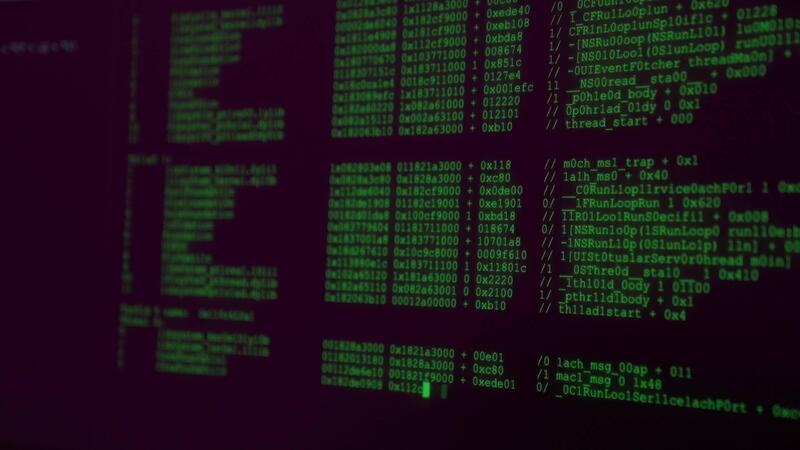 Coding Session With Dual Monitors Displaying Programming Data In A
