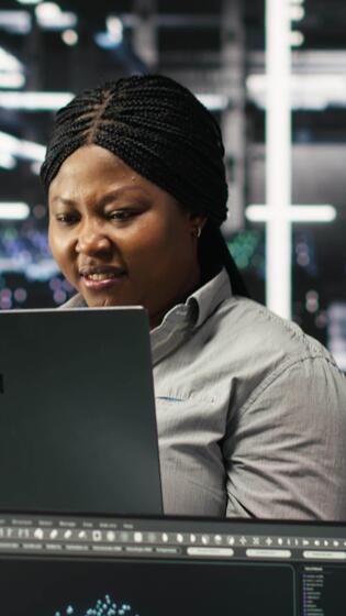 Vertical Annoyed data center IT expert having malfunctioning gear while using node tree tool ...