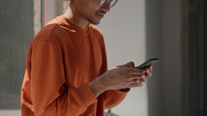 Person Scrolling On Phone Stock Video Footage for Free Download