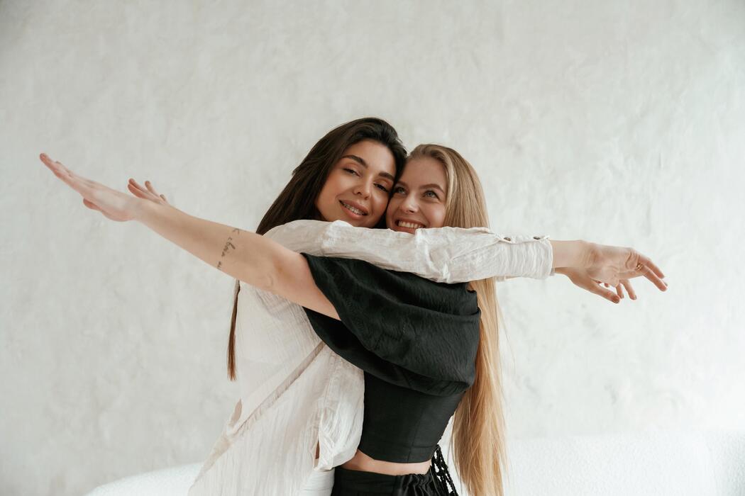 Two People Hugging Stock Photos, Images and Backgrounds for Free Download