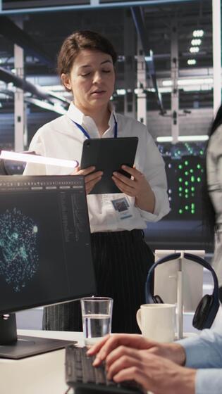 Vertical Server Hub Supervisor Overseeing Data Scientist Examining Neural Network Algorithm On