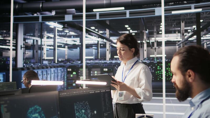 Data Center Team Leader Supervising System Operations Supporting Neural Networks And Analytics