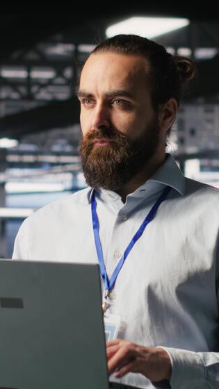 Vertical Computer Scientists On Data Center Industrial Platform Analyzing Performance Outputs On