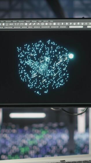 Vertical Elevated industrial data center control station screen showing analytics from servers ...