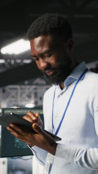 Vertical Admin on data center industrial platform analyzing infrastructure performance outputs ...