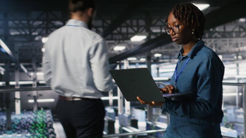 Data Scientist In Server Farm Reviewing Neural Network Code And Llm