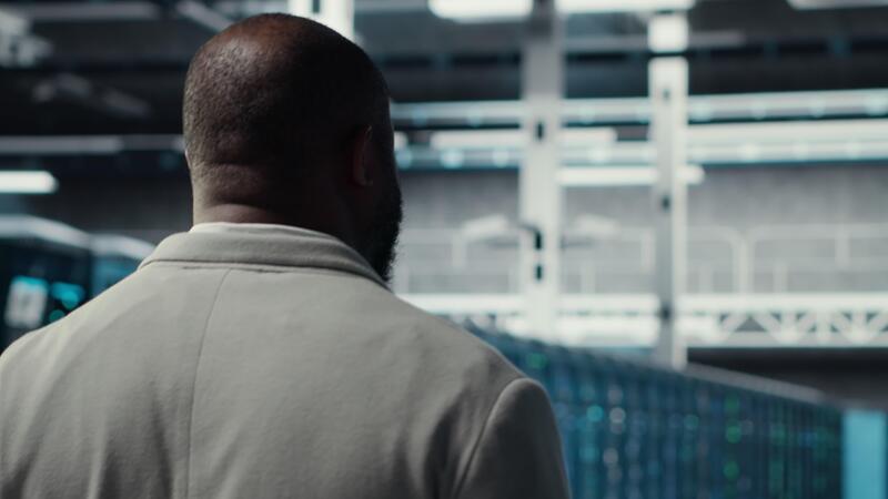 System Administrator In Data Center Doing Inspection On Infrastructure Tech Handling User