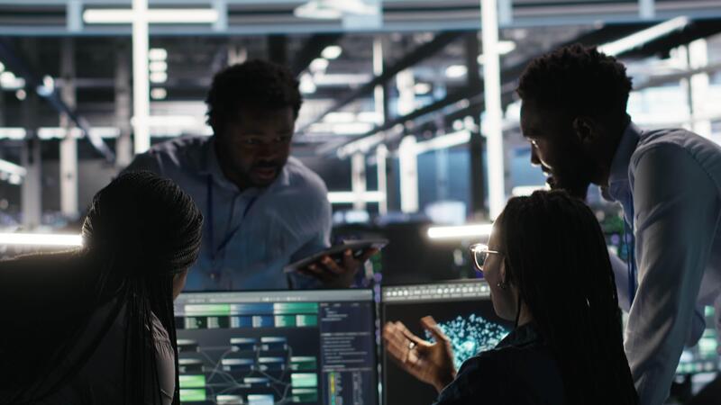 Vertical Data center coworkers doing brainstorming, using node tree software to analyze datasets ...