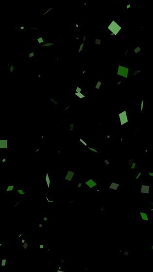 Falling shiny green confetti isolated on transparent black vertical background. Bright festive ...