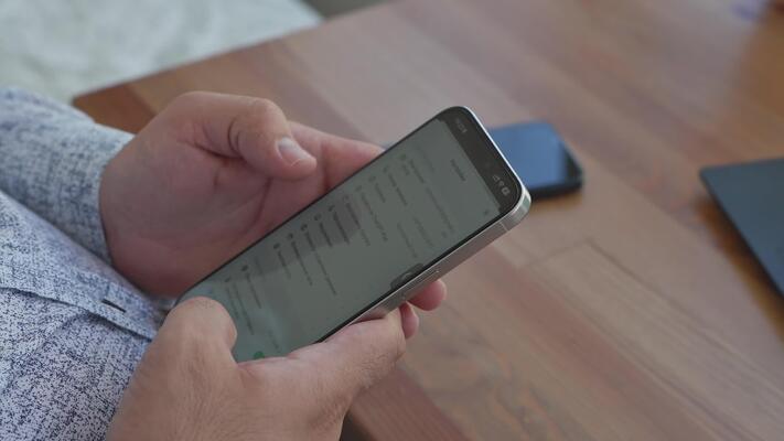 Person Scrolling On Phone Stock Video Footage for Free Download