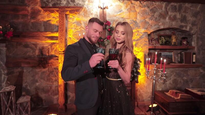 Beautiful young adult couple celebrating holidays in old fashionable ...