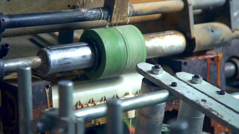 Metal rollers rotating quickly in the machine. Equipment for wood ...