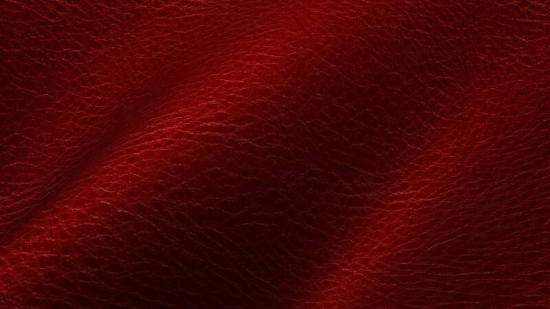 Red leather texture waves forming bold animated flow adding strong ...